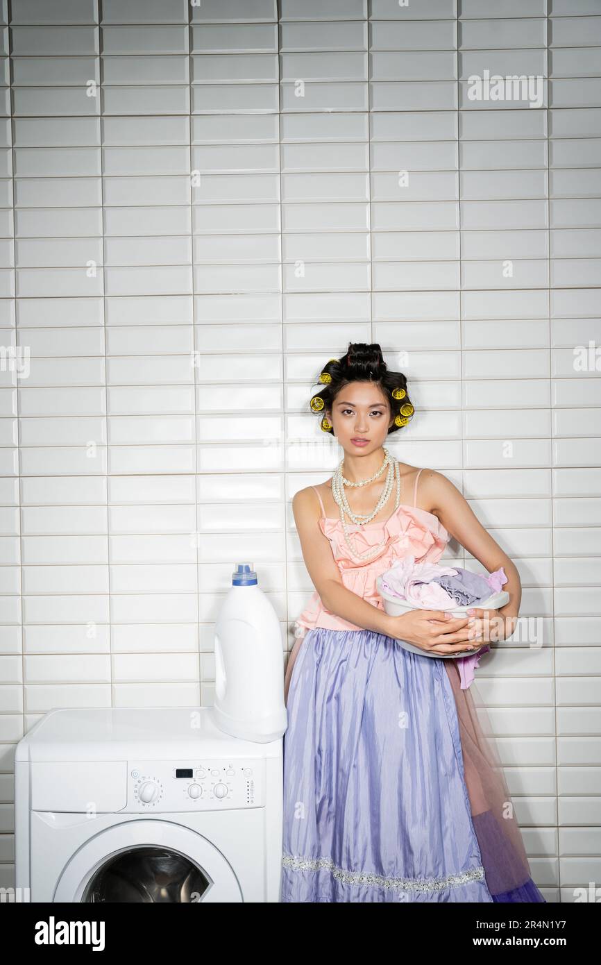 Asian woman washing clothes hi-res stock photography and images - Alamy