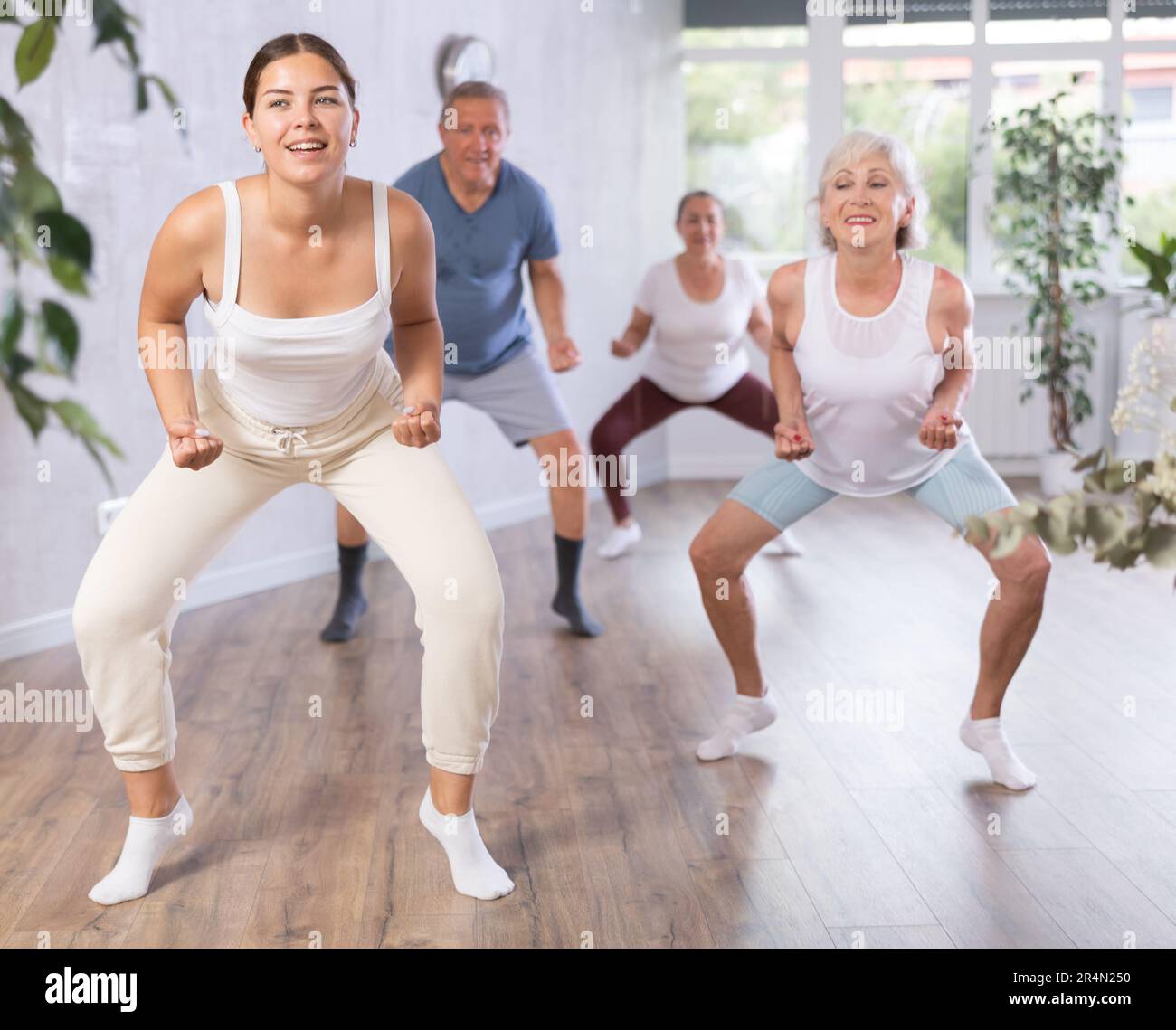 Group of people of different ages dancing in studio Stock Photo - Alamy