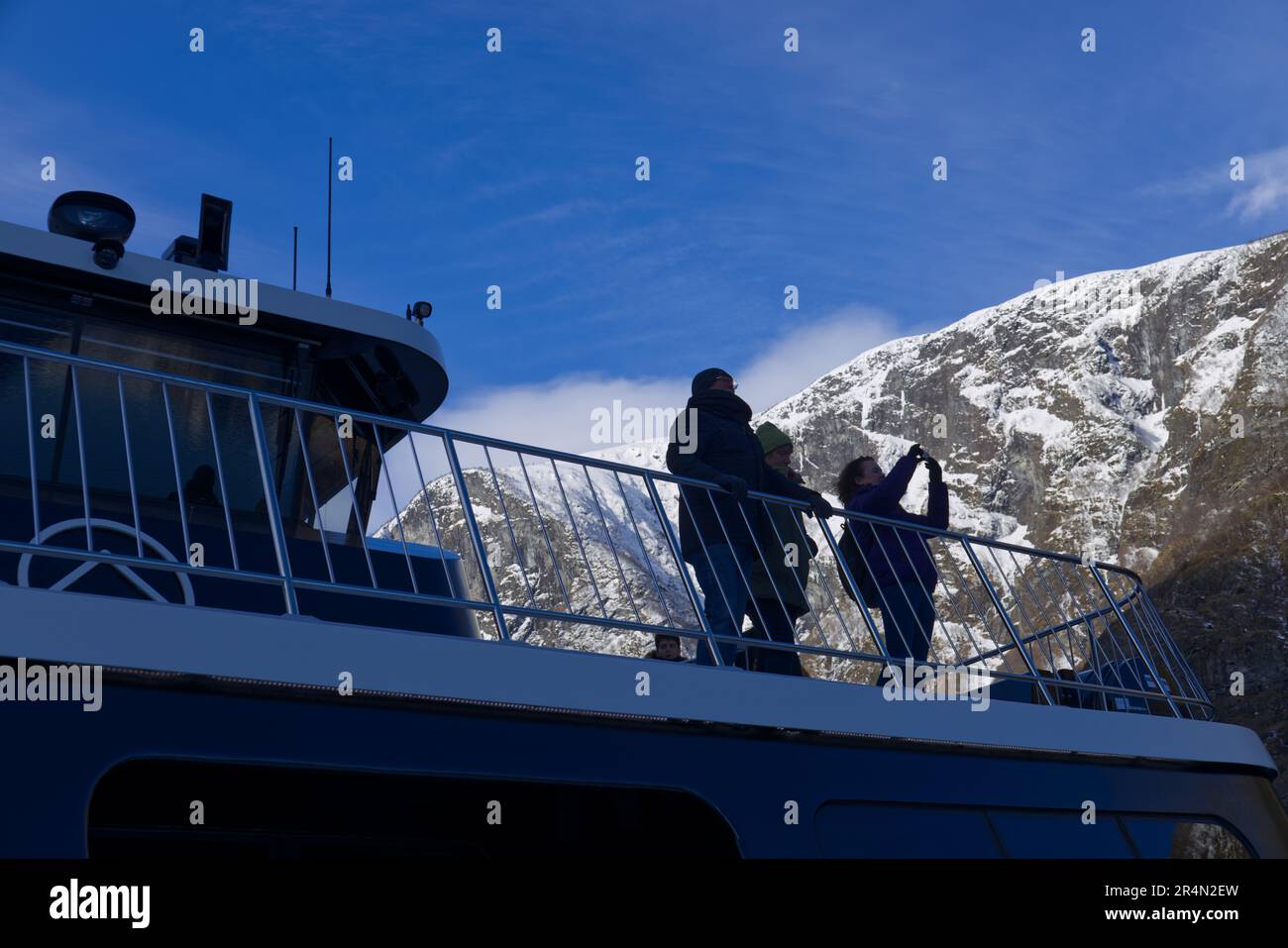 Flam to Gudvangen fjord ferry cruise in Norway - People in silhouette ...