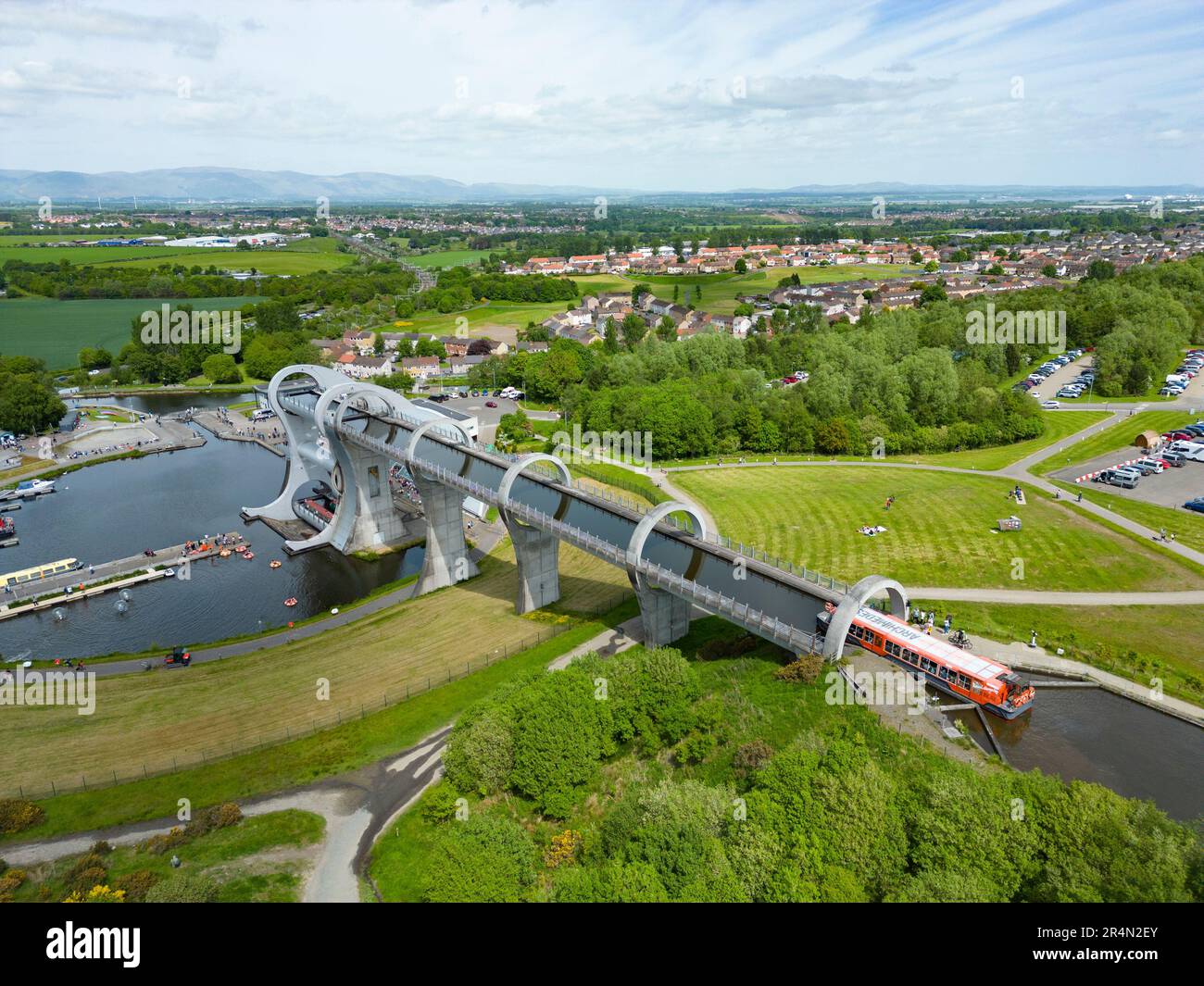 Aerial view from drone of Falkirk Wheel rotating boat lift on Forth and ...