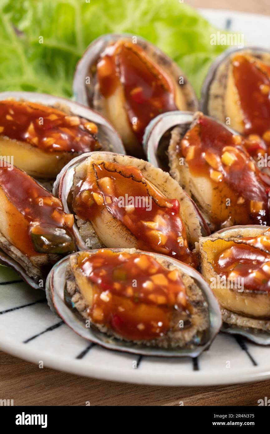 Delicious steamed abalone with spicy tomato sauce, Taiwanese five ...