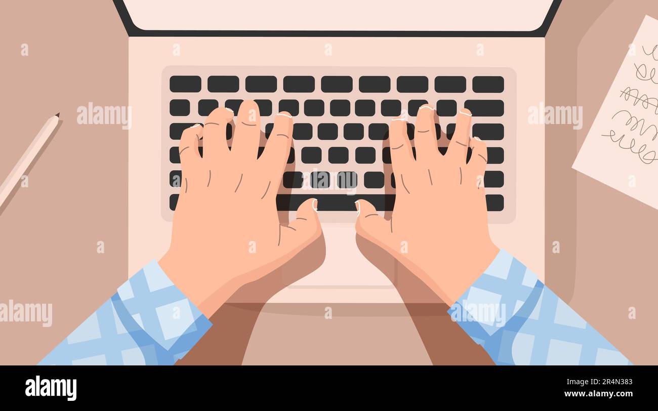 Hands at work behind a laptop keyboard with at the table. Workplace at ...