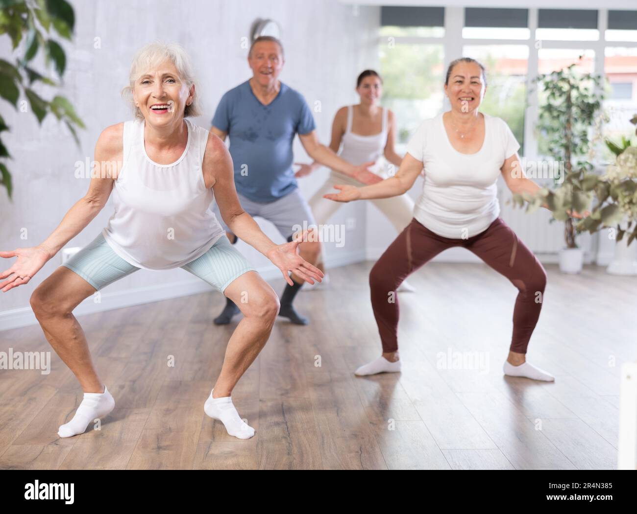Group of people of different ages dancing in studio Stock Photo - Alamy