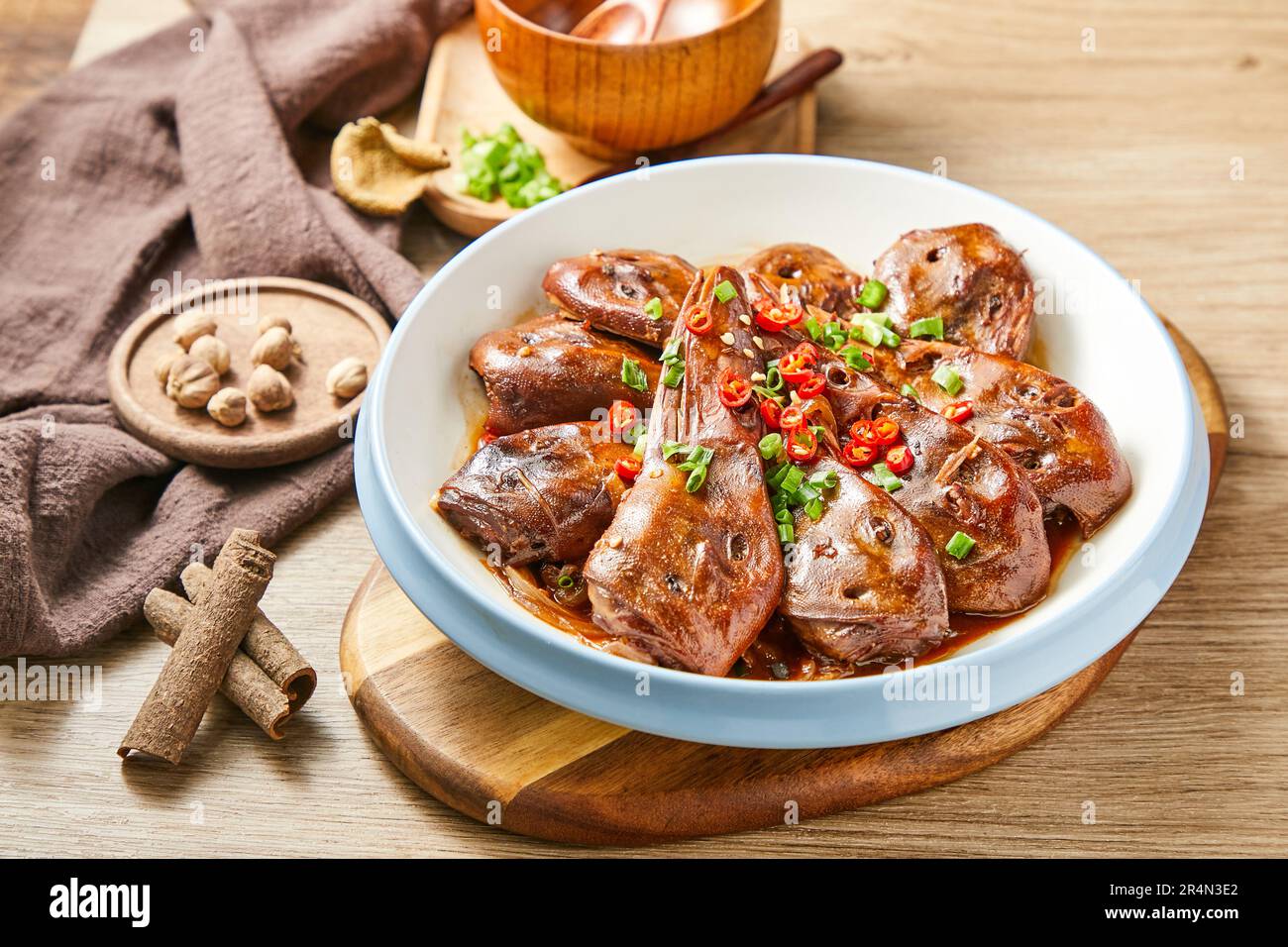 Chinese traditional cuisine: spicy duck head Stock Photo - Alamy