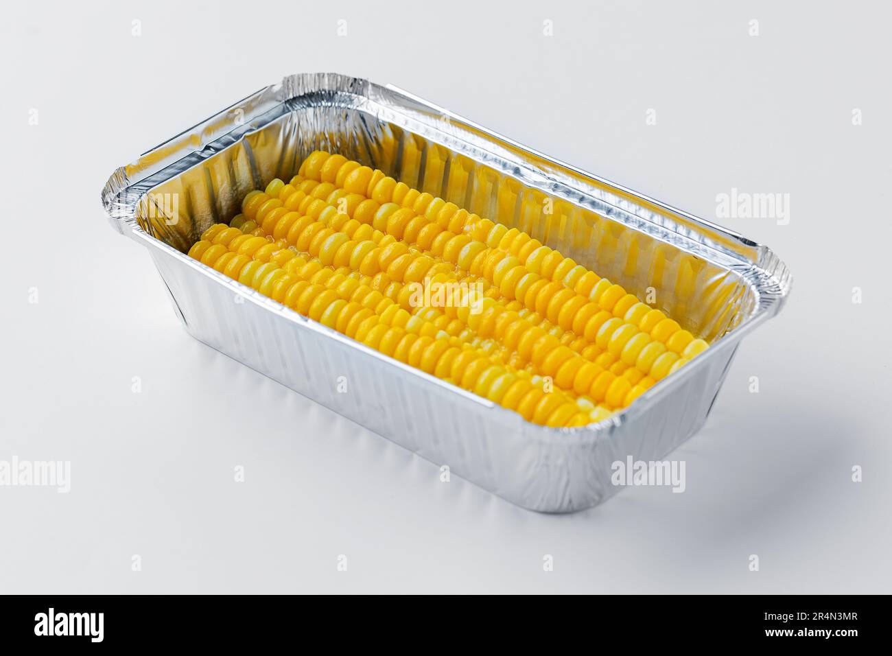 Tin Foil Sweet corn kernels Stock Photo - Alamy
