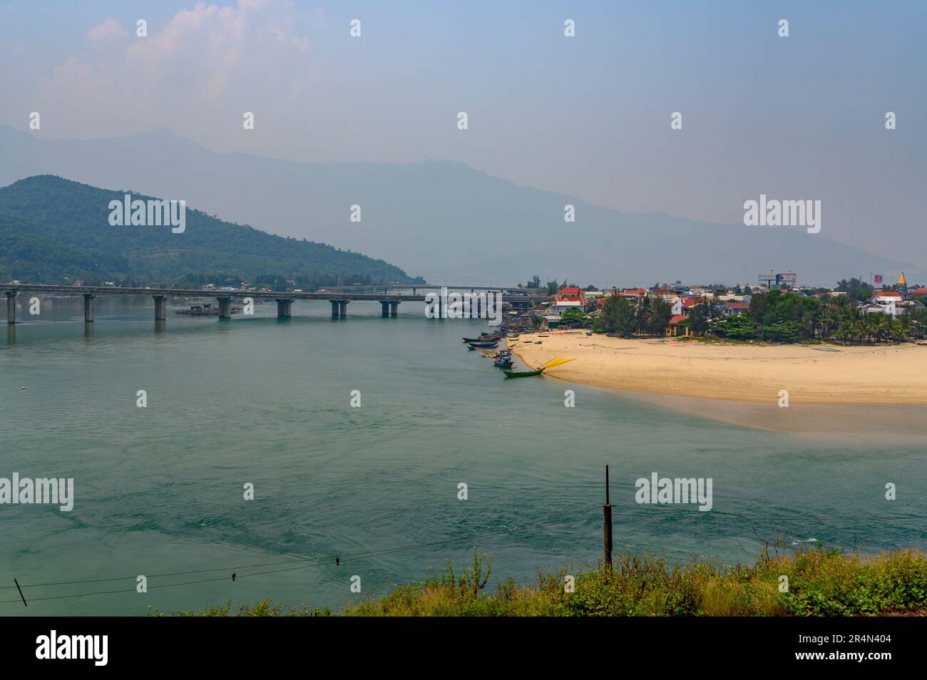 View over Lang Co village, lagoon and bridge from National Route 1 road ...