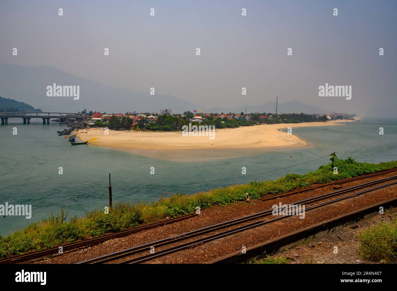 View over Lang Co village, lagoon and bridge from National Route 1 road ...