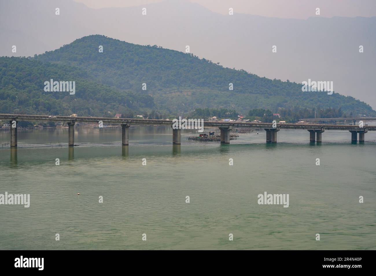 View over Lang Co lagoon and bridge from National Route 1 road view ...