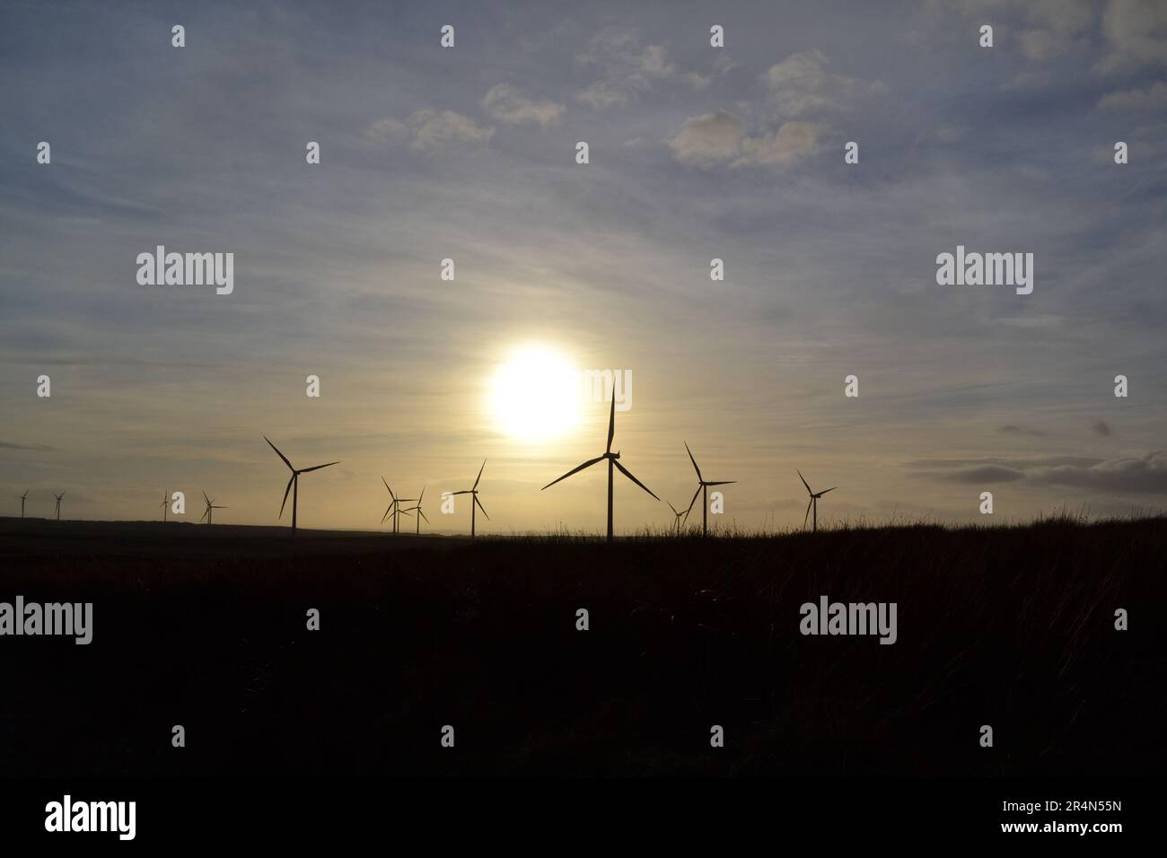 Wind farm sunset uk hi-res stock photography and images - Alamy