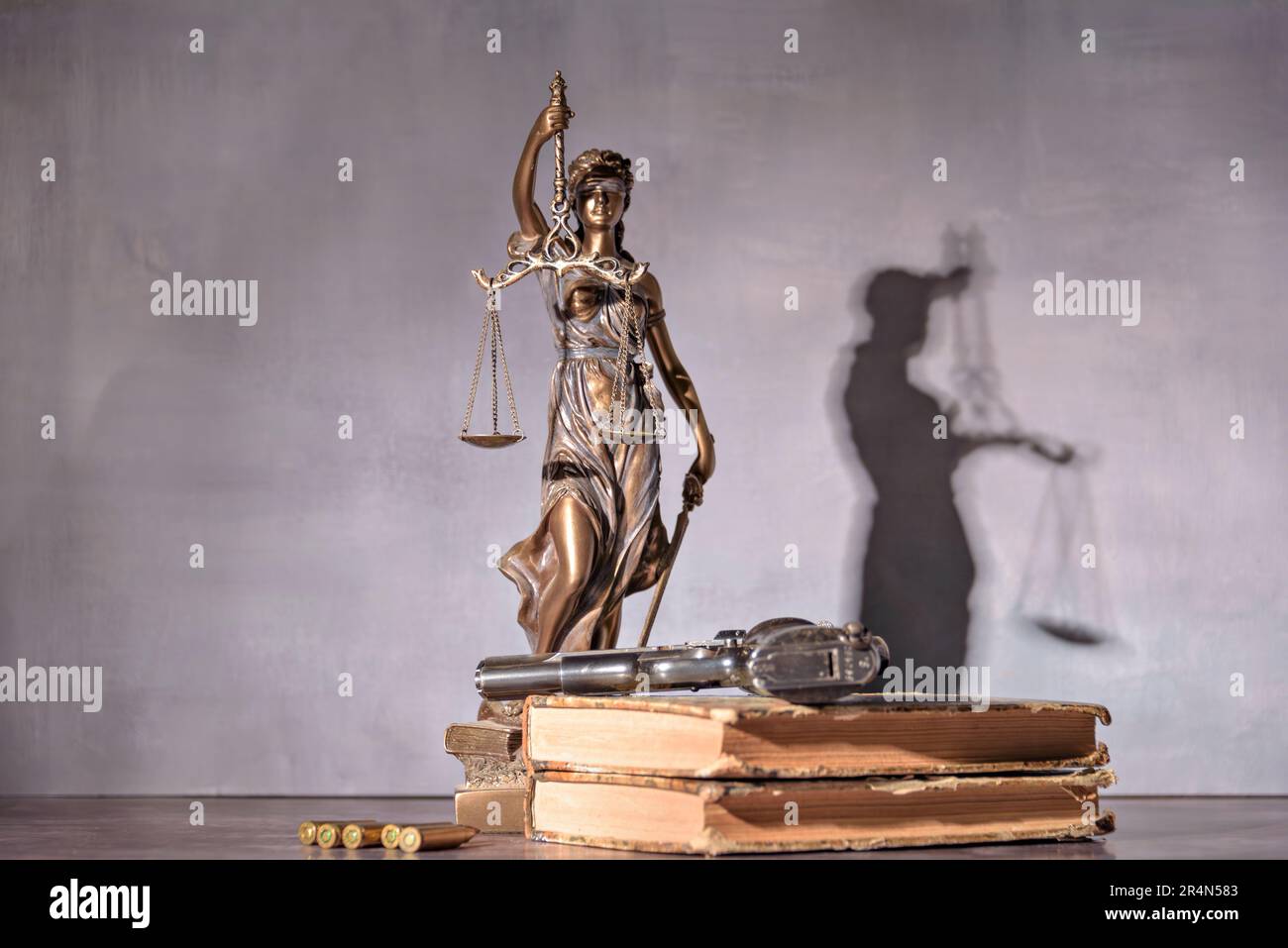 Gun in the foreground with the background is a representation of ...