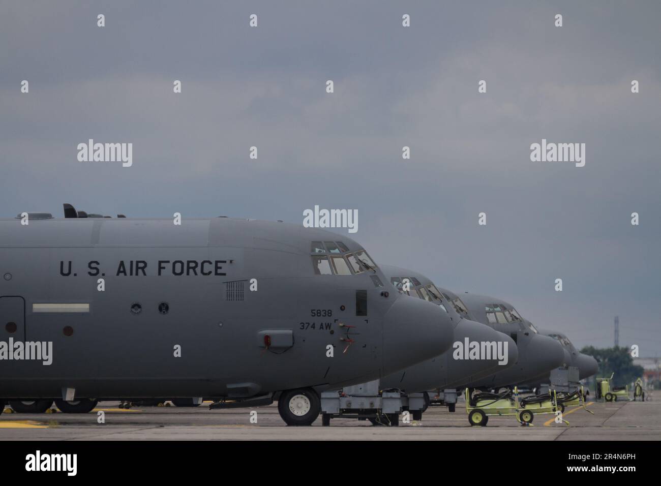 A line of USAF Lockheed Martin C130-J Hercules aircraft at Yokota ...