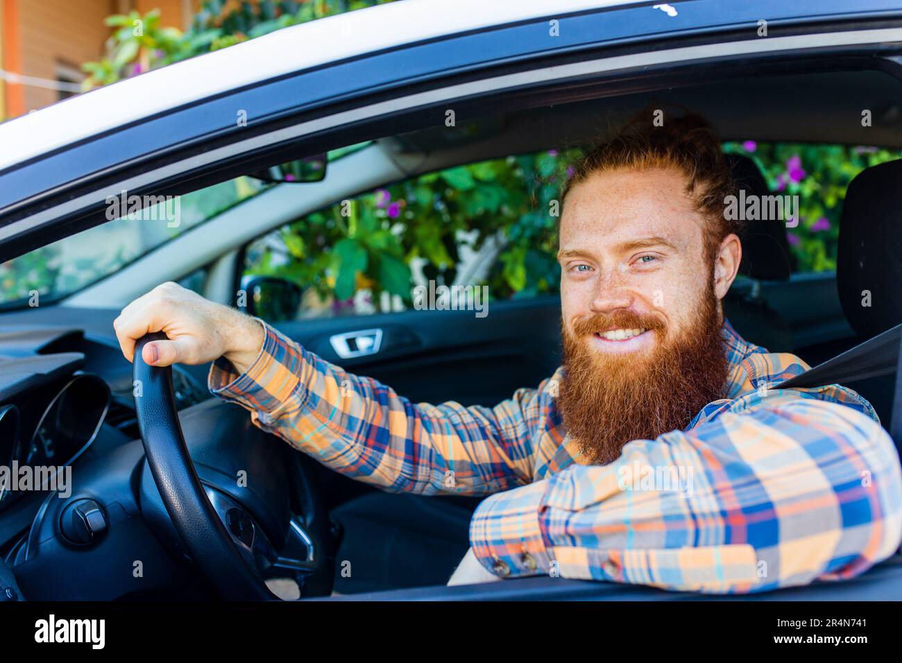 handsome redhaired ginger man with long beard going on trip during ...
