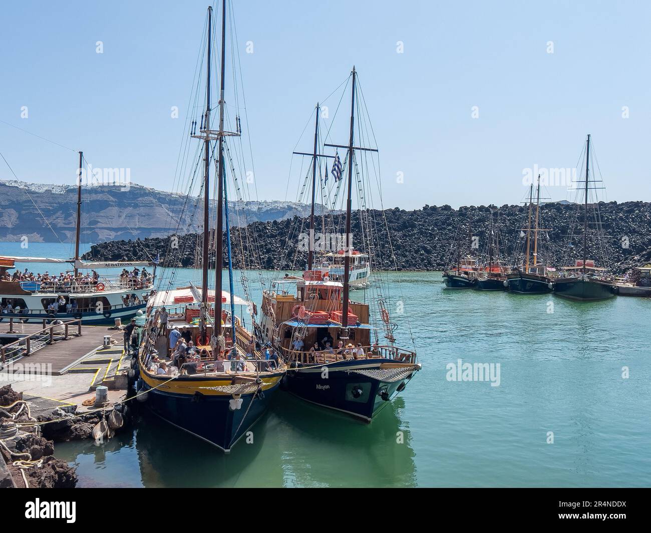 ship parked at small port Stock Photo - Alamy