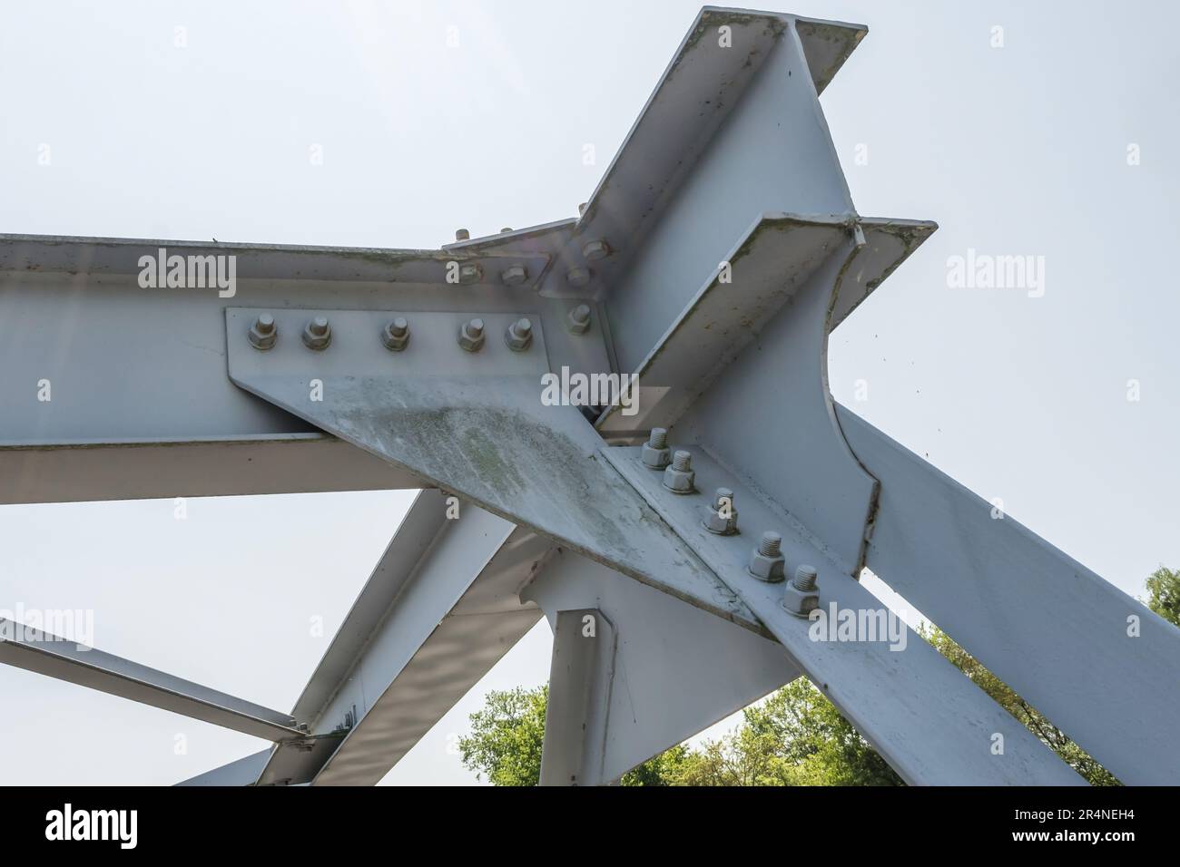 Bolts and nuts on metal plates of steel structure of heavy duty ...