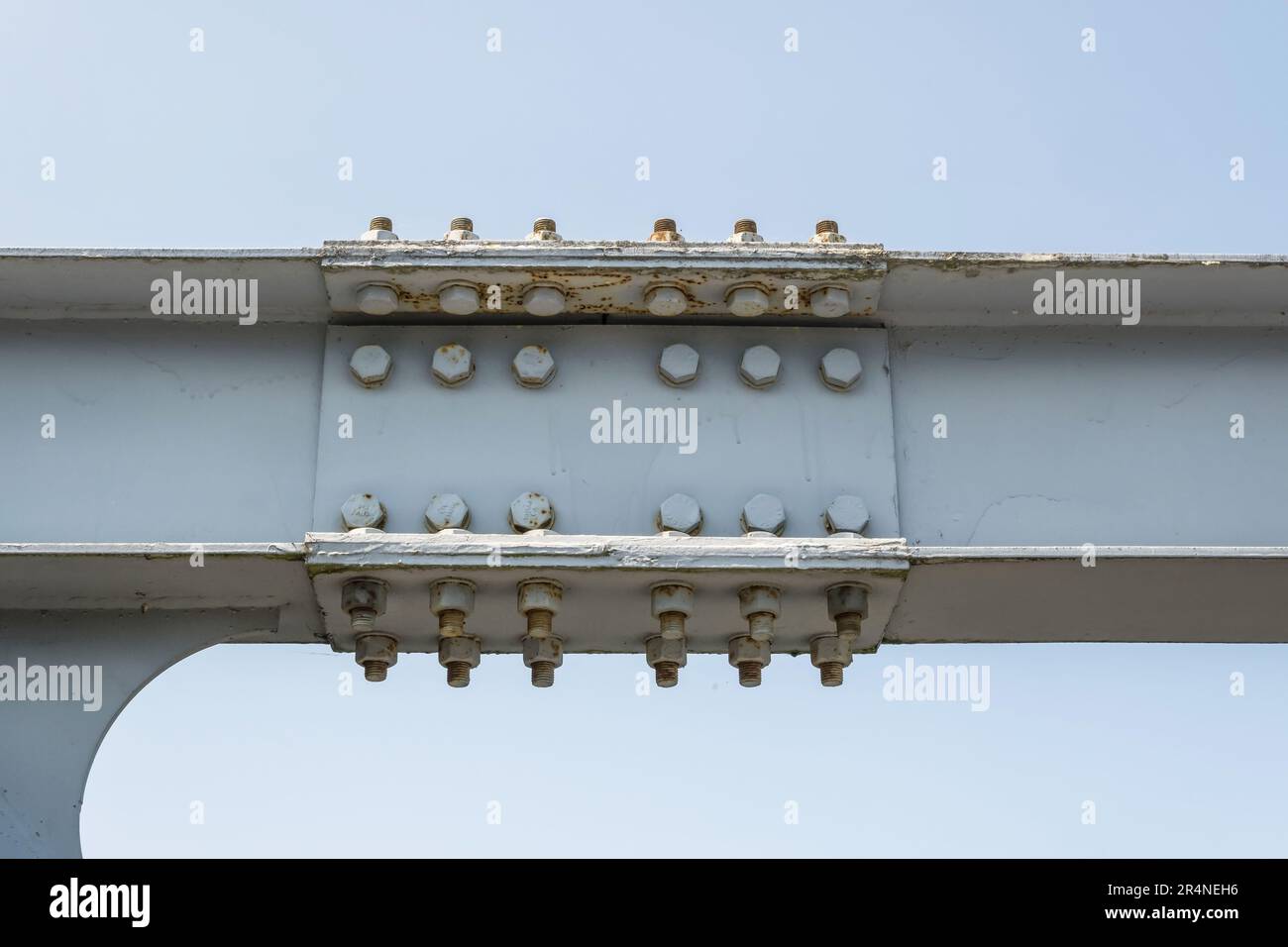 Bolts and nuts on metal plates of steel structure of heavy duty ...
