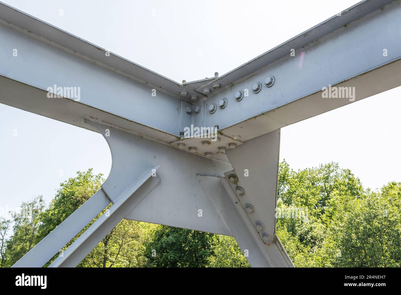 Bolts and nuts on metal plates of steel structure of heavy duty ...