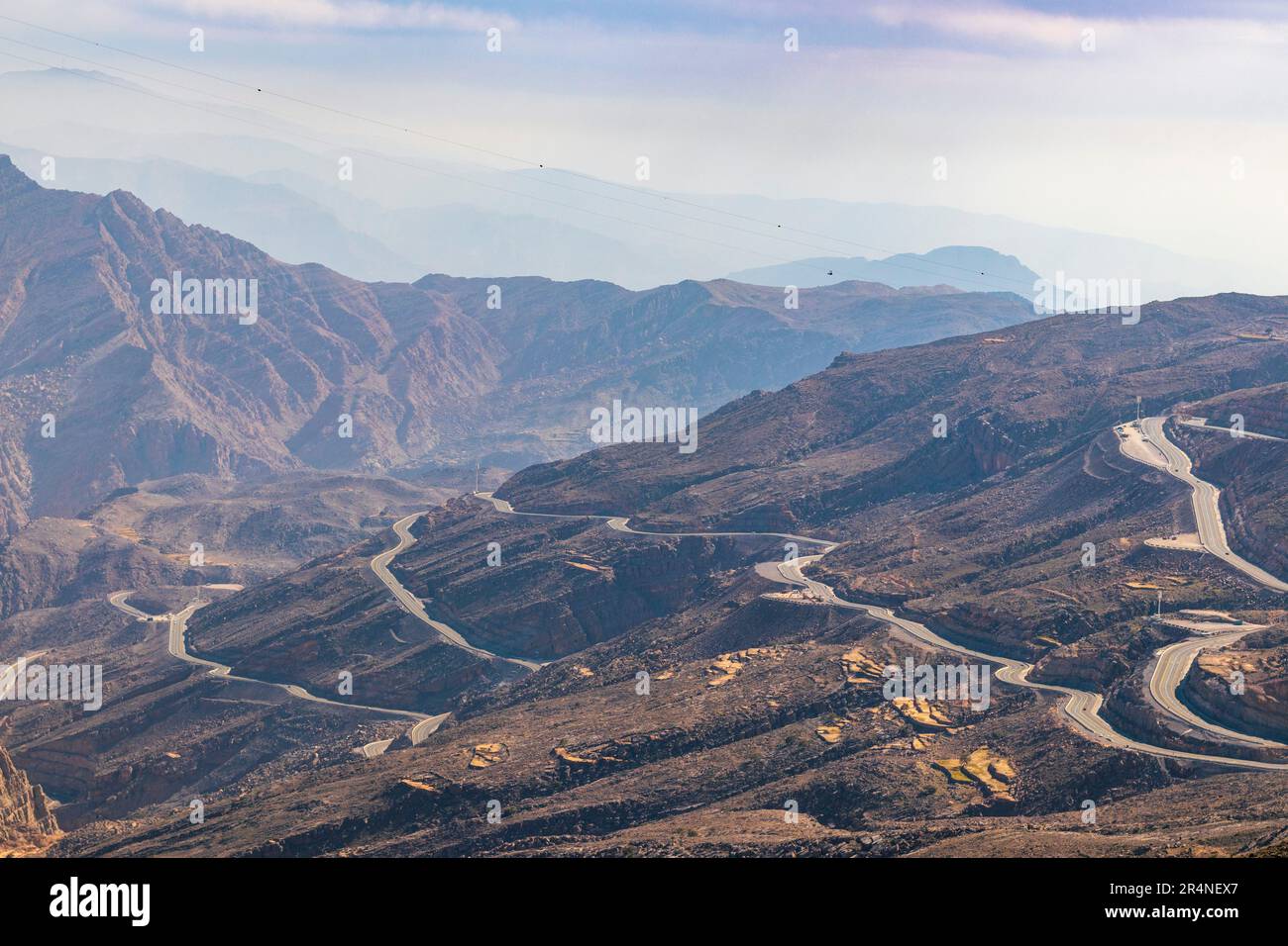People in the zip line in the mountainous area Stock Photo - Alamy