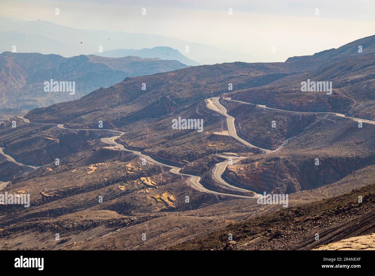 People in the zip line in the mountainous area Stock Photo - Alamy