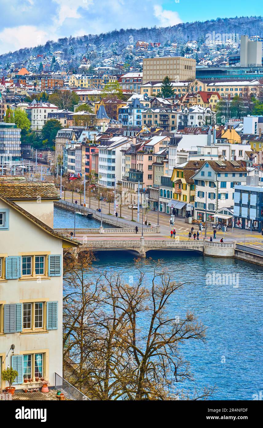 The view from Lindenhof Hill on Limmat river and its banks and bridges ...