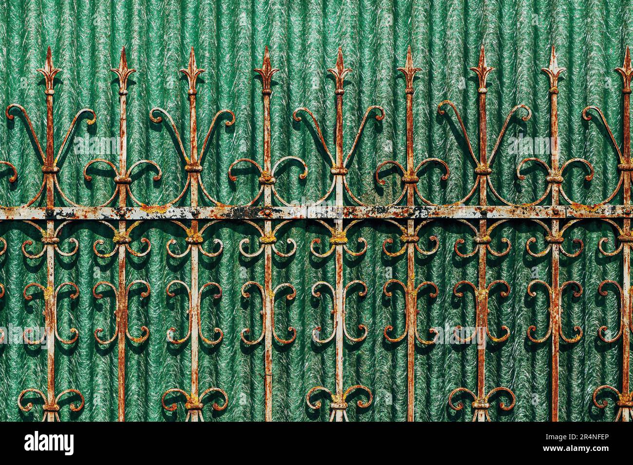 Old wrought iron fence pattern as background, rusty metal decoration ...