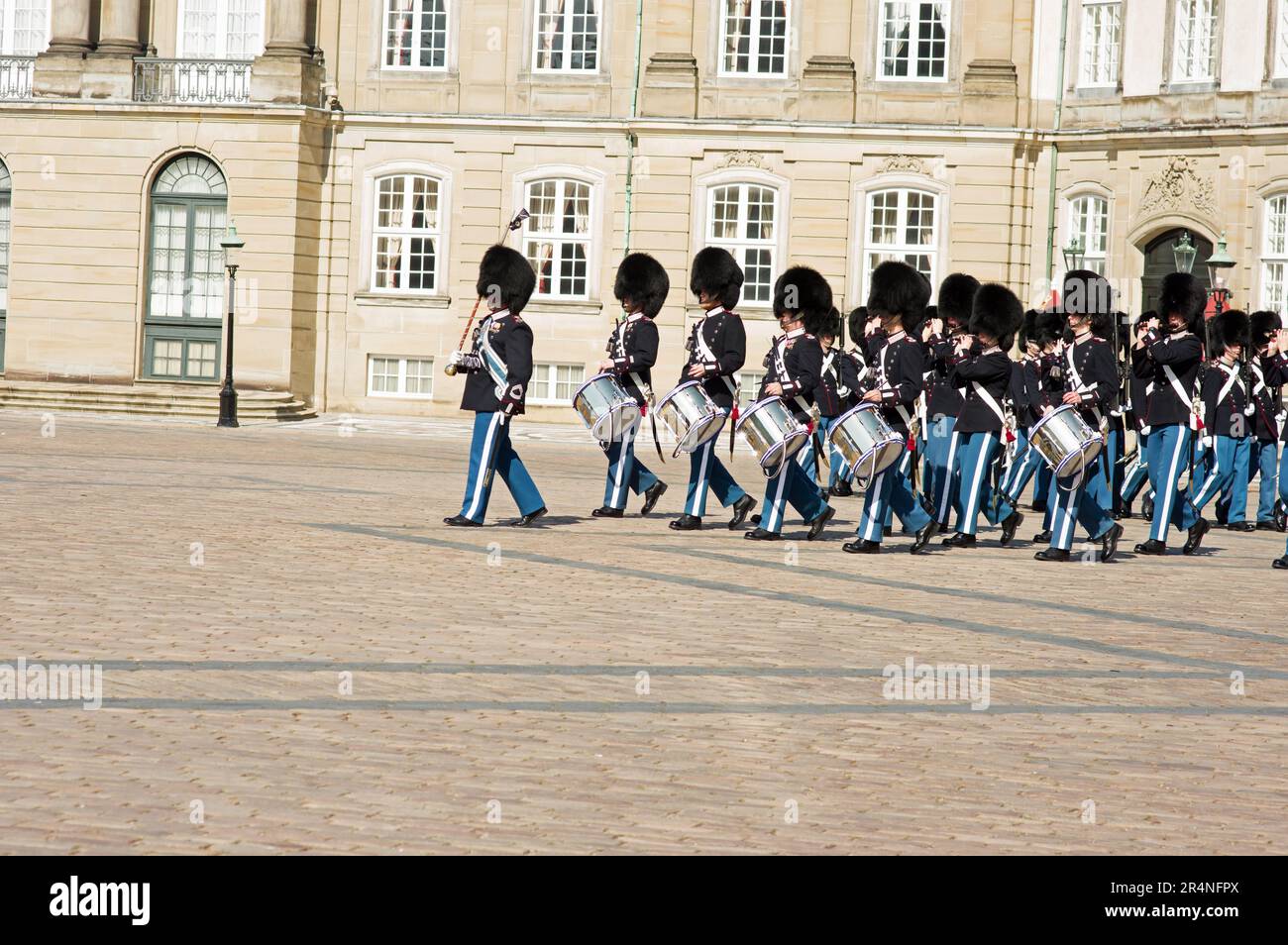 Copenhagen, Denmark - April 8, 2023: Royal guards marching during the change of the guards with ...
