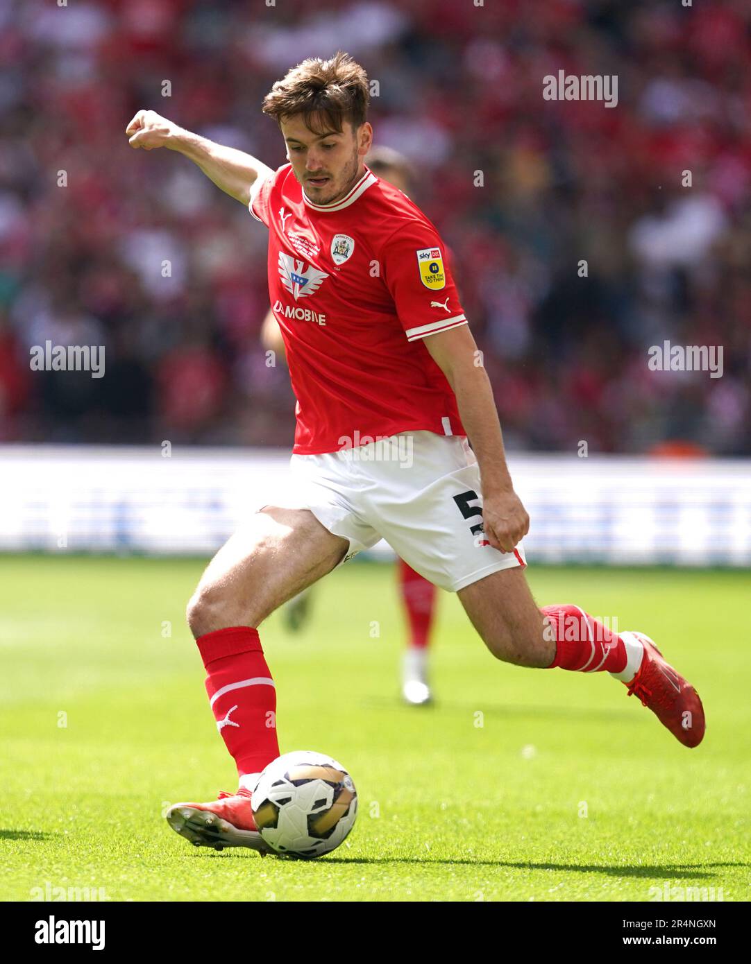 Barnsley's Liam Kitching attempts a shot on goal during the Sky Bet ...