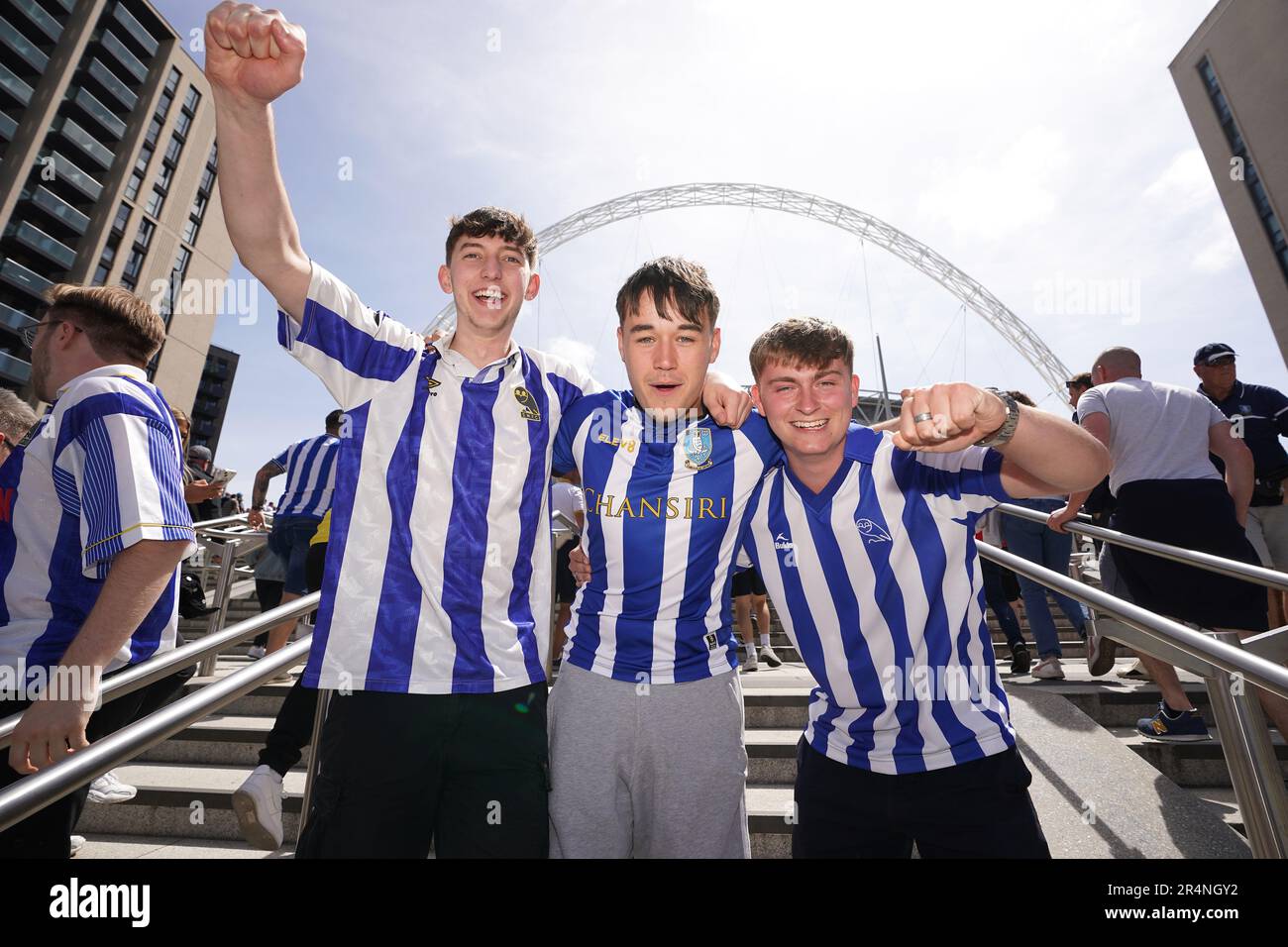 Sheffield Wednesday fan Isaac Parkin (right) and fans pose for ...