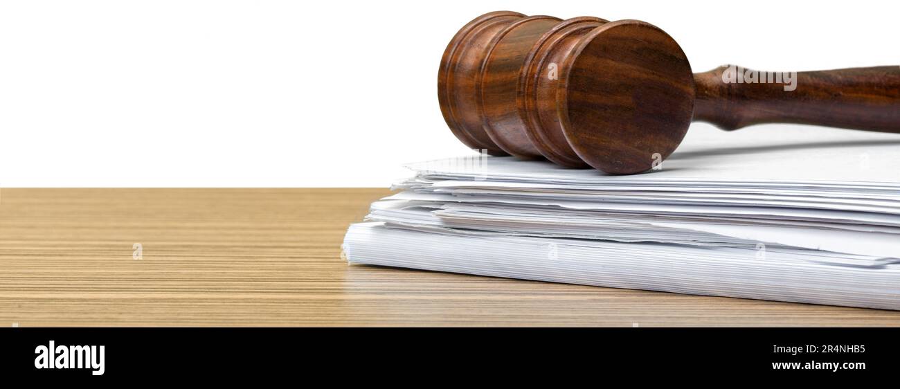 judge hammer on white paper and table Stock Photo - Alamy