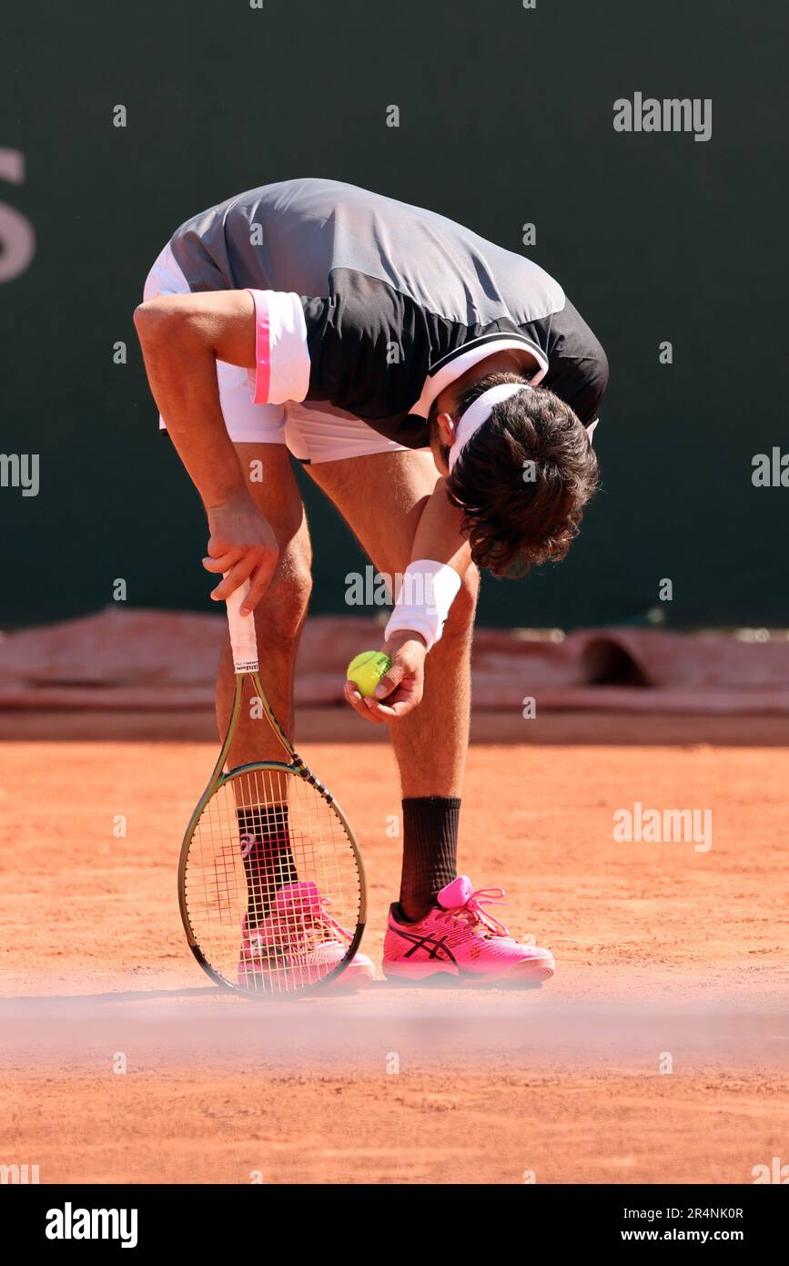 Paris, France. 28th May, 2023. Emilio Nava of the US returns the ball ...