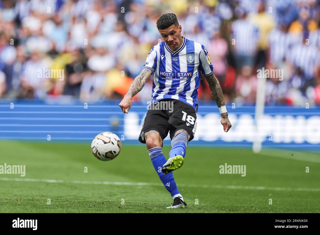 Marvin Johnson #18 of Sheffield Wednesday passes the ballcduring the ...