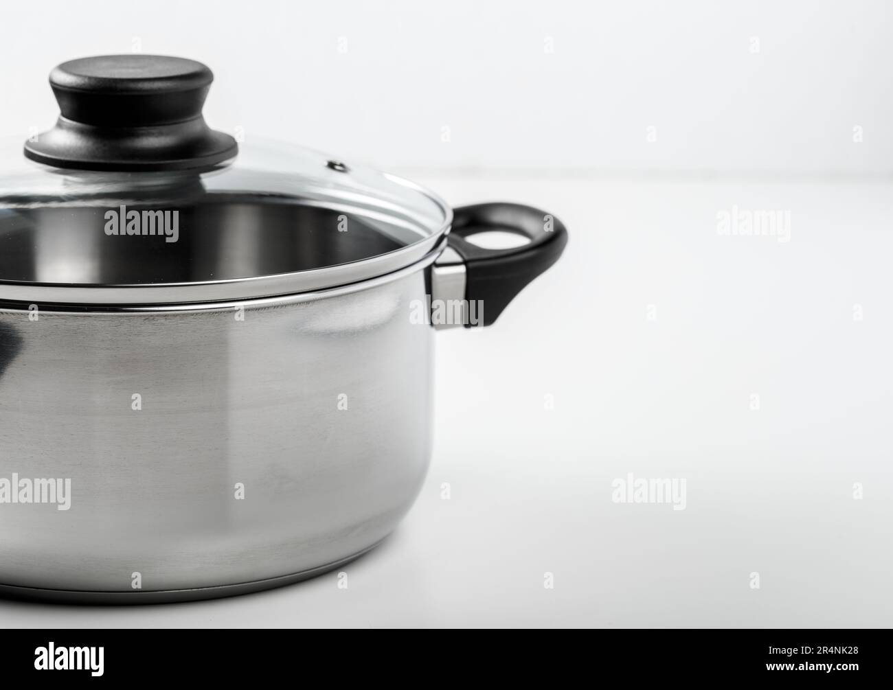 Steel saucepan isolated on white background Stock Photo - Alamy