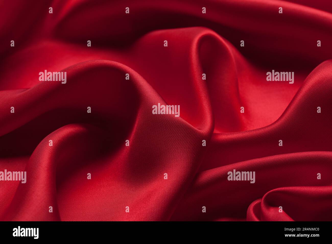 Red cloth waves background texture Stock Photo - Alamy