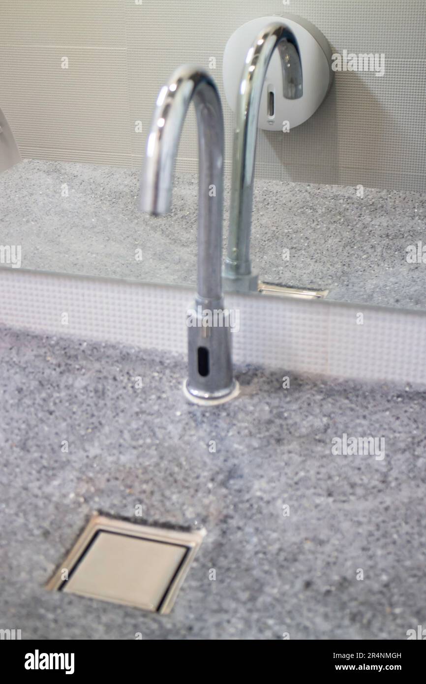 Touchless tap in public toilet and restroom, stock photo Stock Photo ...