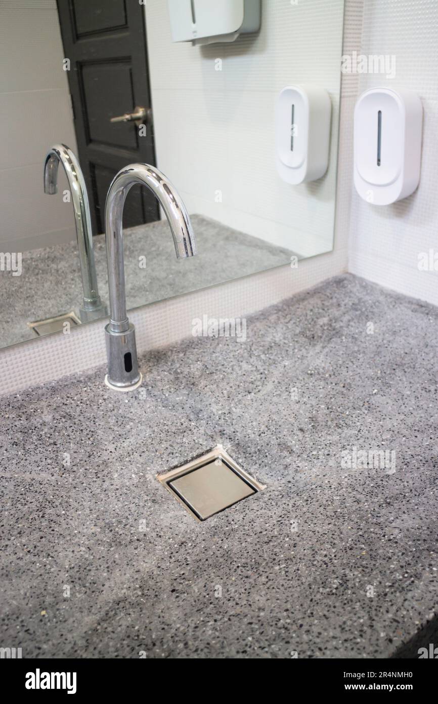 Touchless tap in public toilet and restroom, stock photo Stock Photo ...