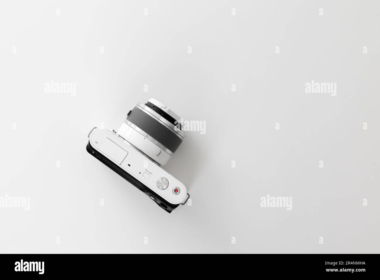 Digital camera isolated on white background Stock Photo - Alamy