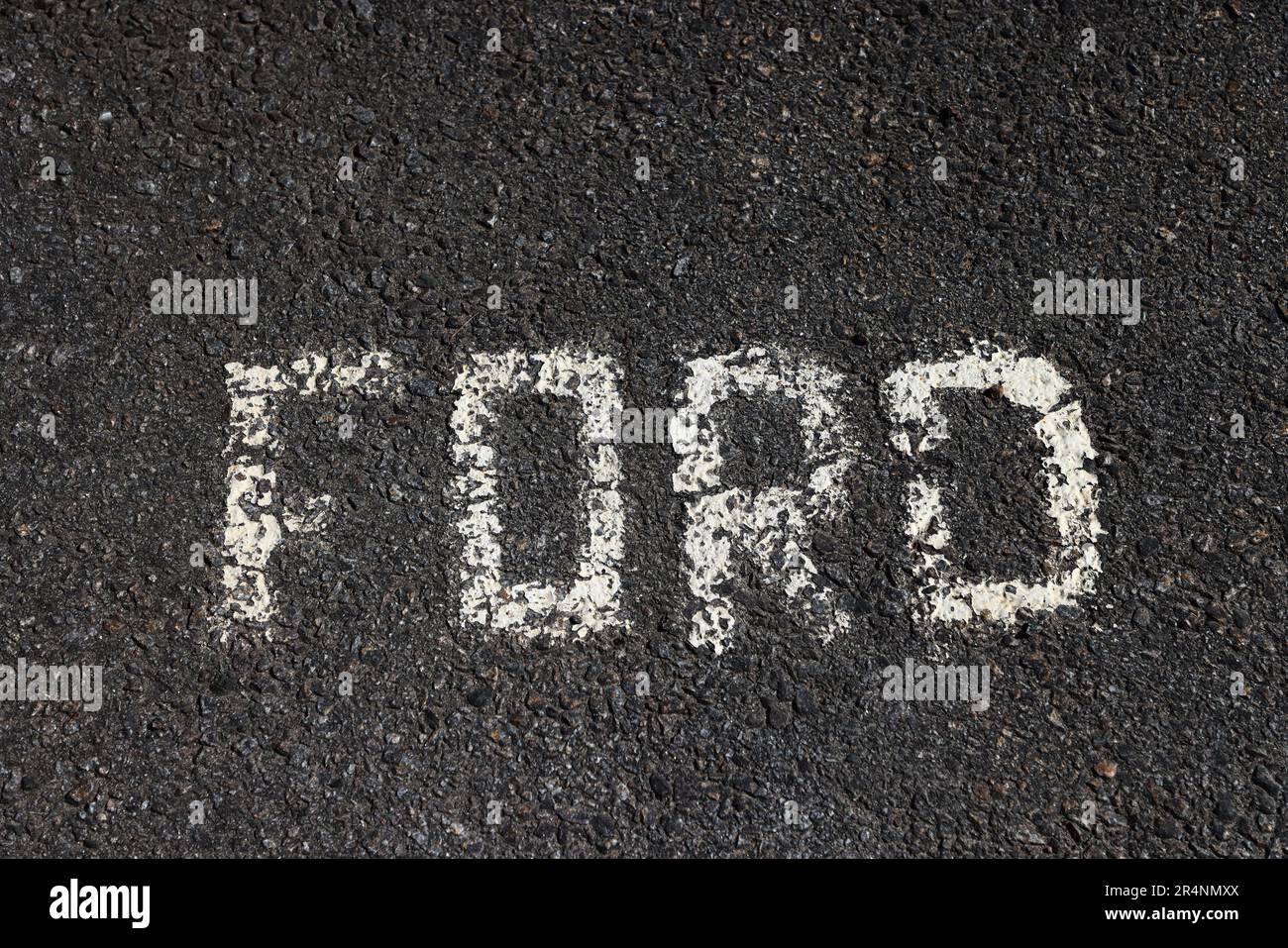 Signs and symbols, Ford (Ford Motor Company) written in the asphalt ...