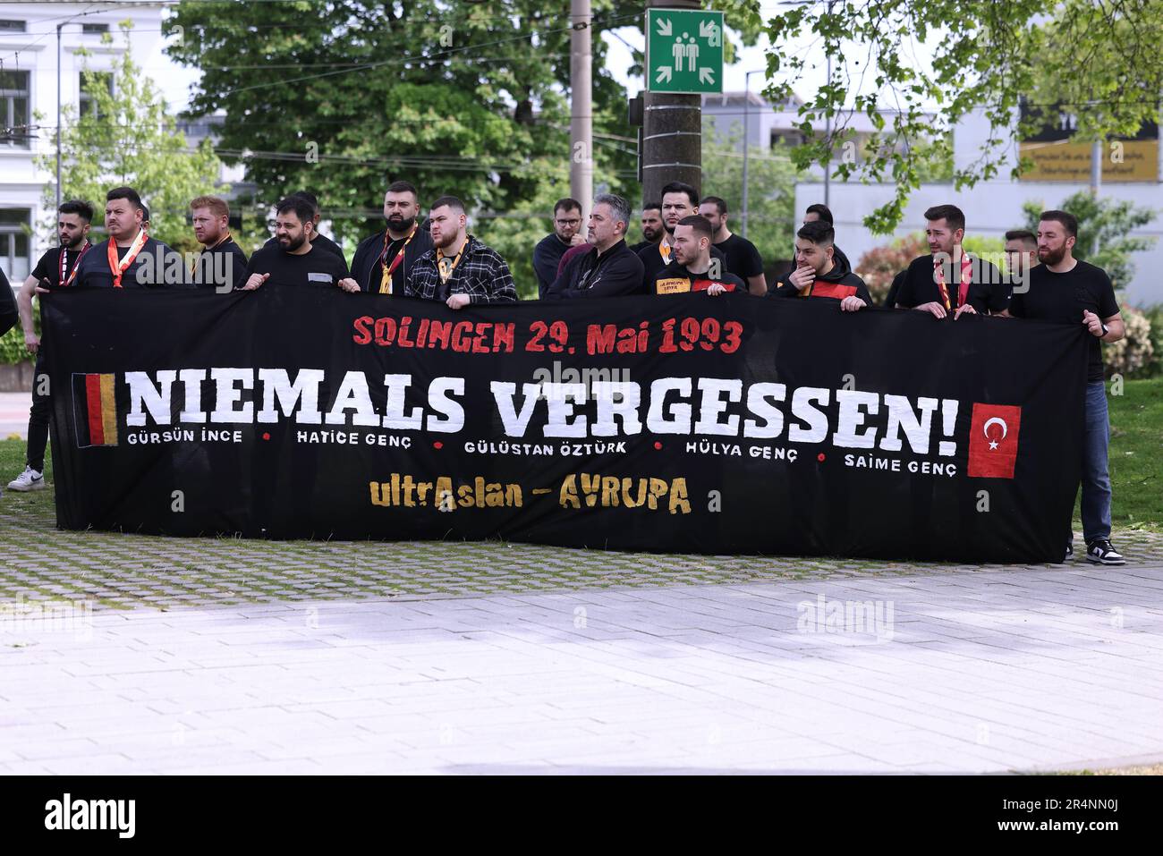 Solingen, Germany. 29th May, 2023. People stand with a banner reading ...