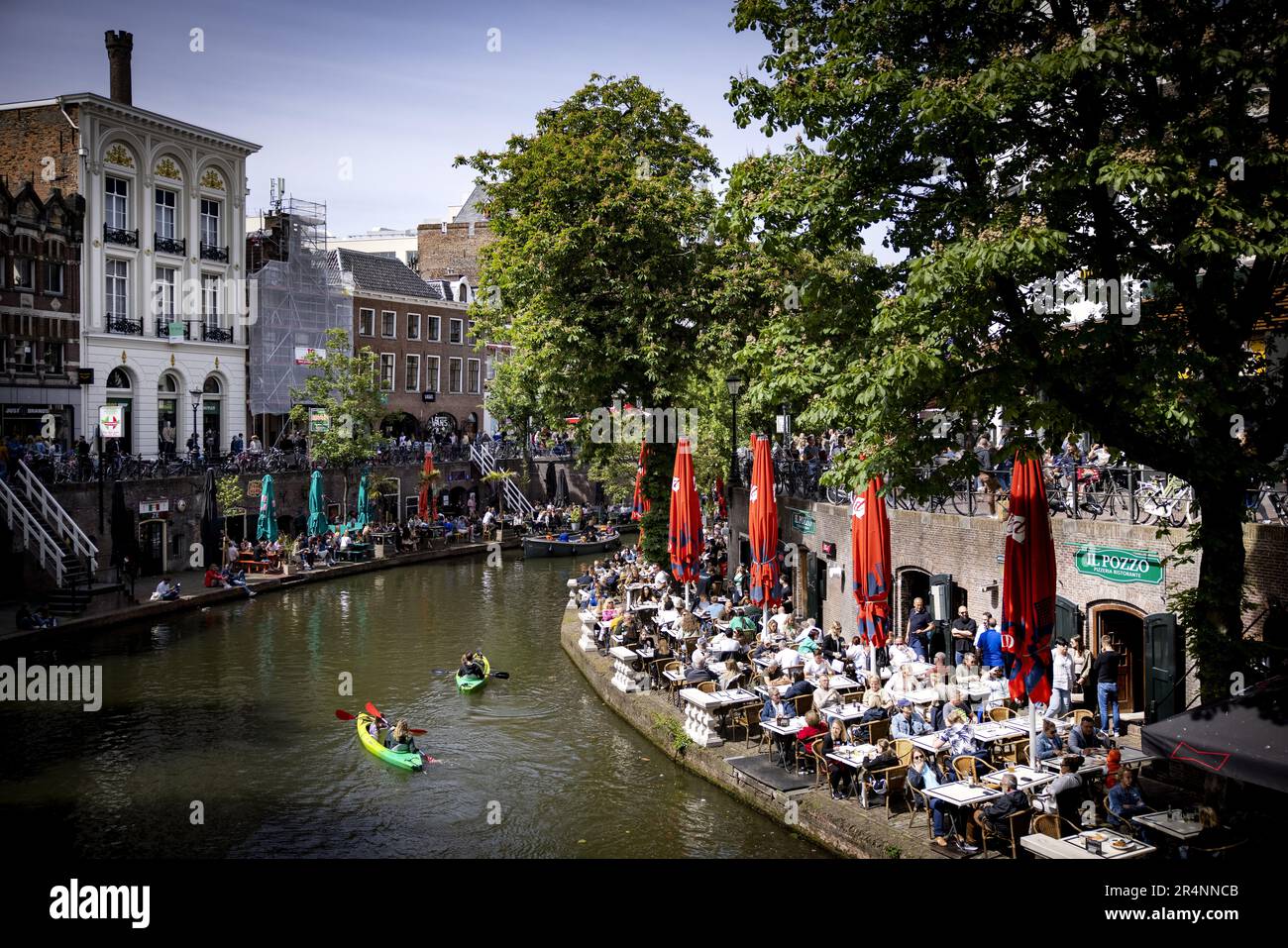 UTRECHT - Day trippers sit on the terrace on Whit Monday. Many people ...