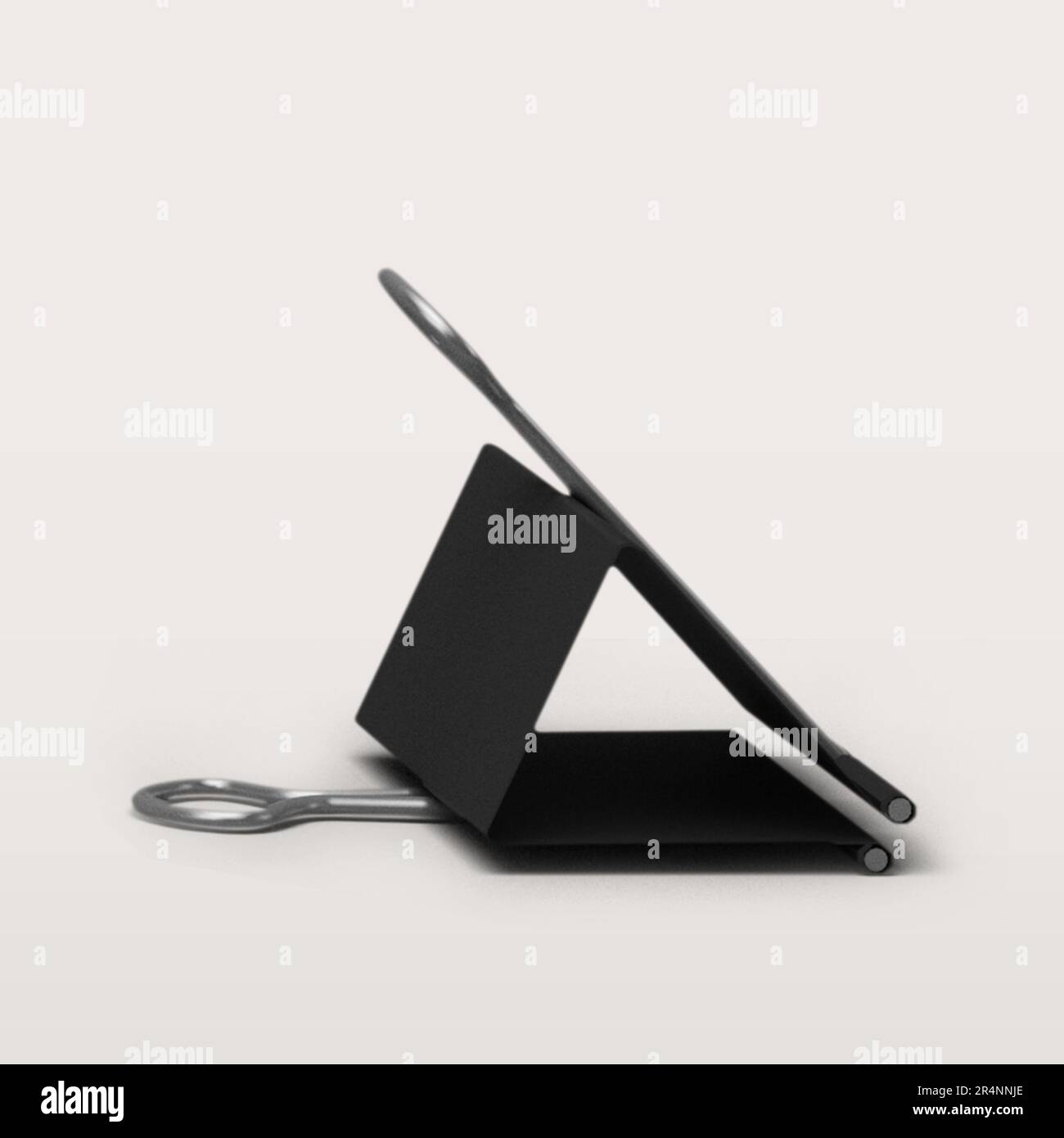 Black metal paper pin isolated on white background Stock Photo - Alamy