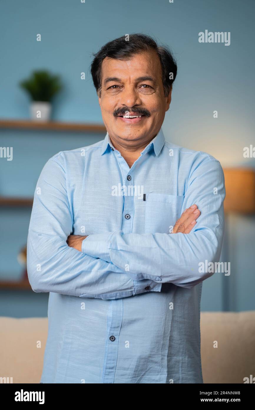 Indian man standing confidently hi-res stock photography and images - Alamy