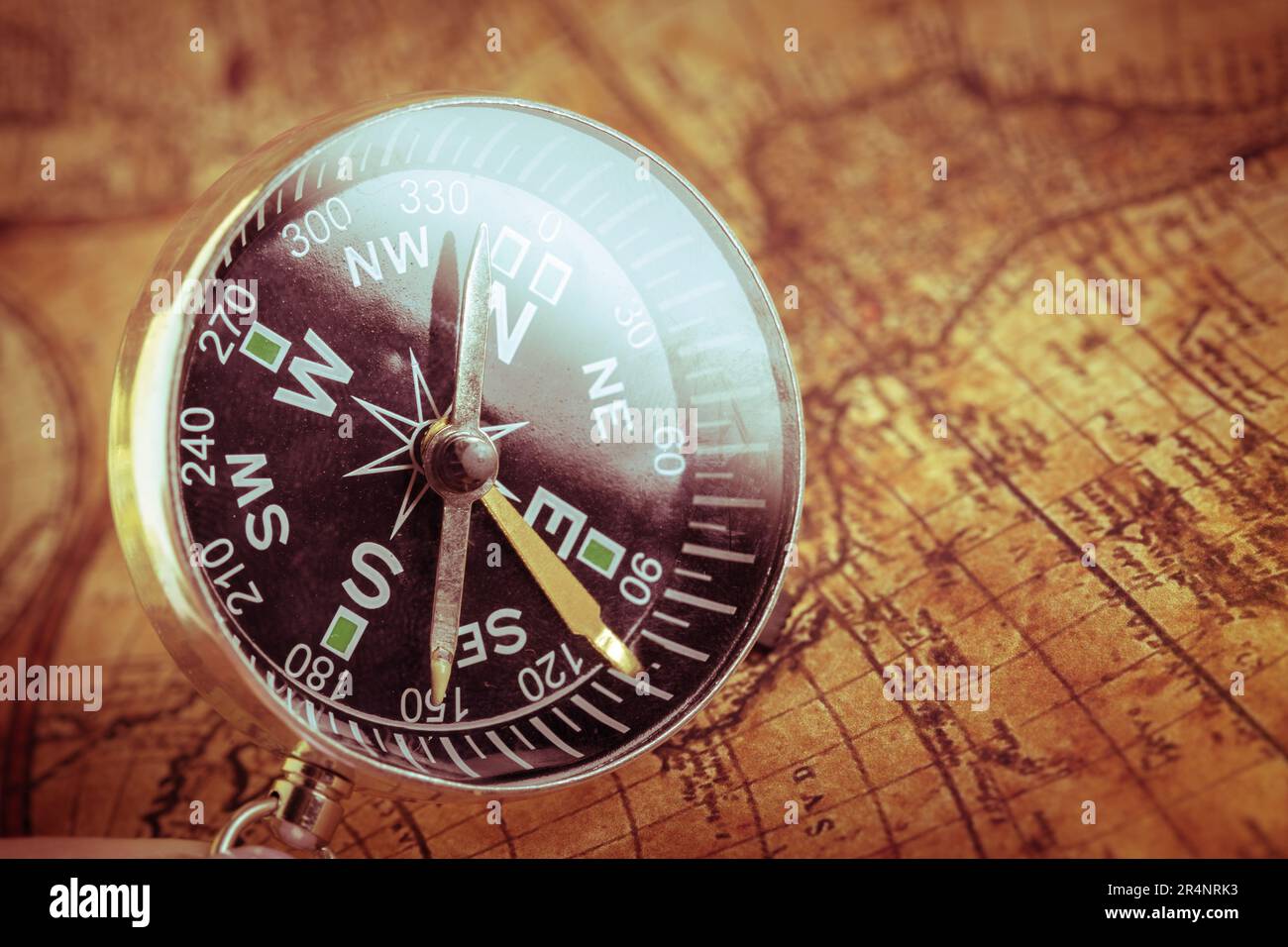 Old compass on vintage map Stock Photo - Alamy