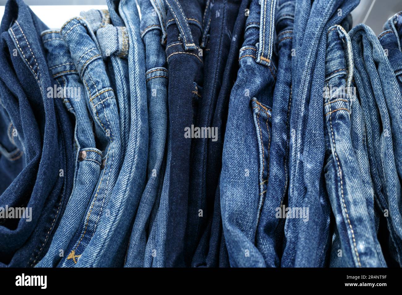 Pile of jeans Stock Photo - Alamy