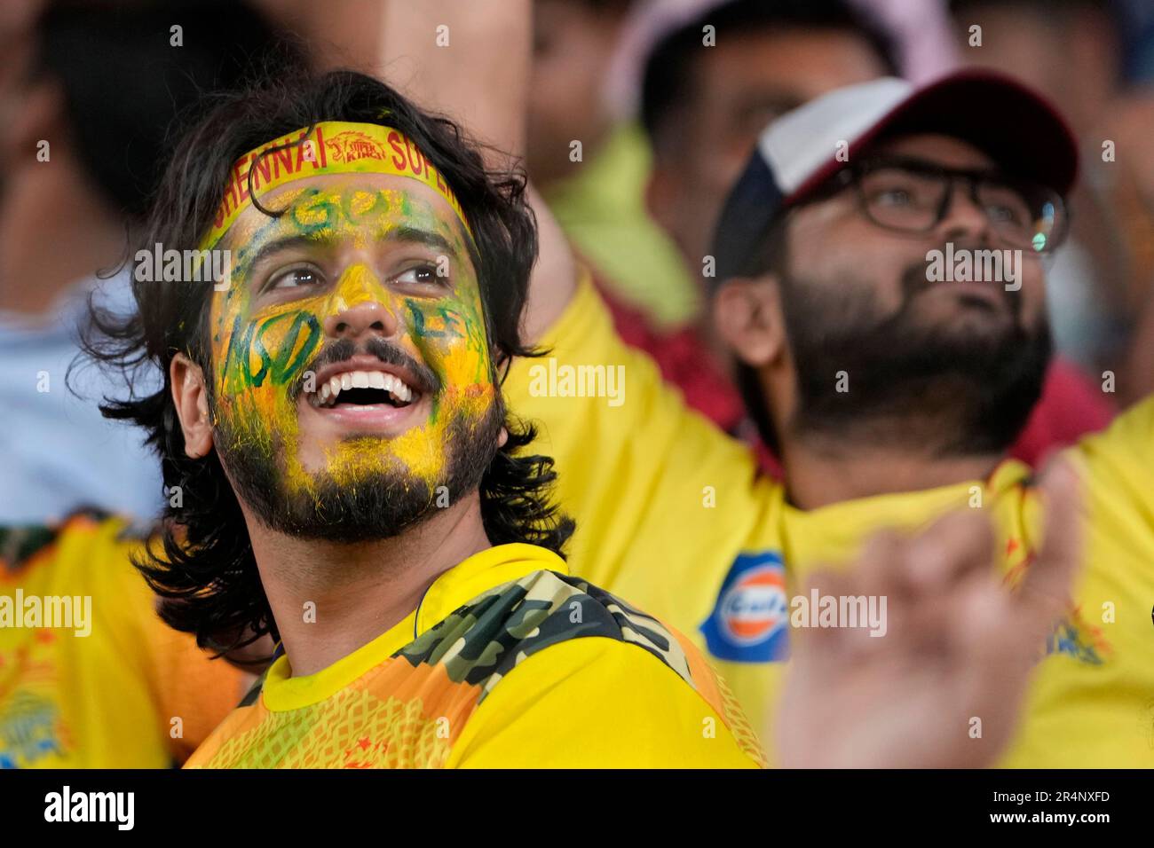 A fan of Chennai Super Kings' captain MS Dhoni reacts during the Indian ...