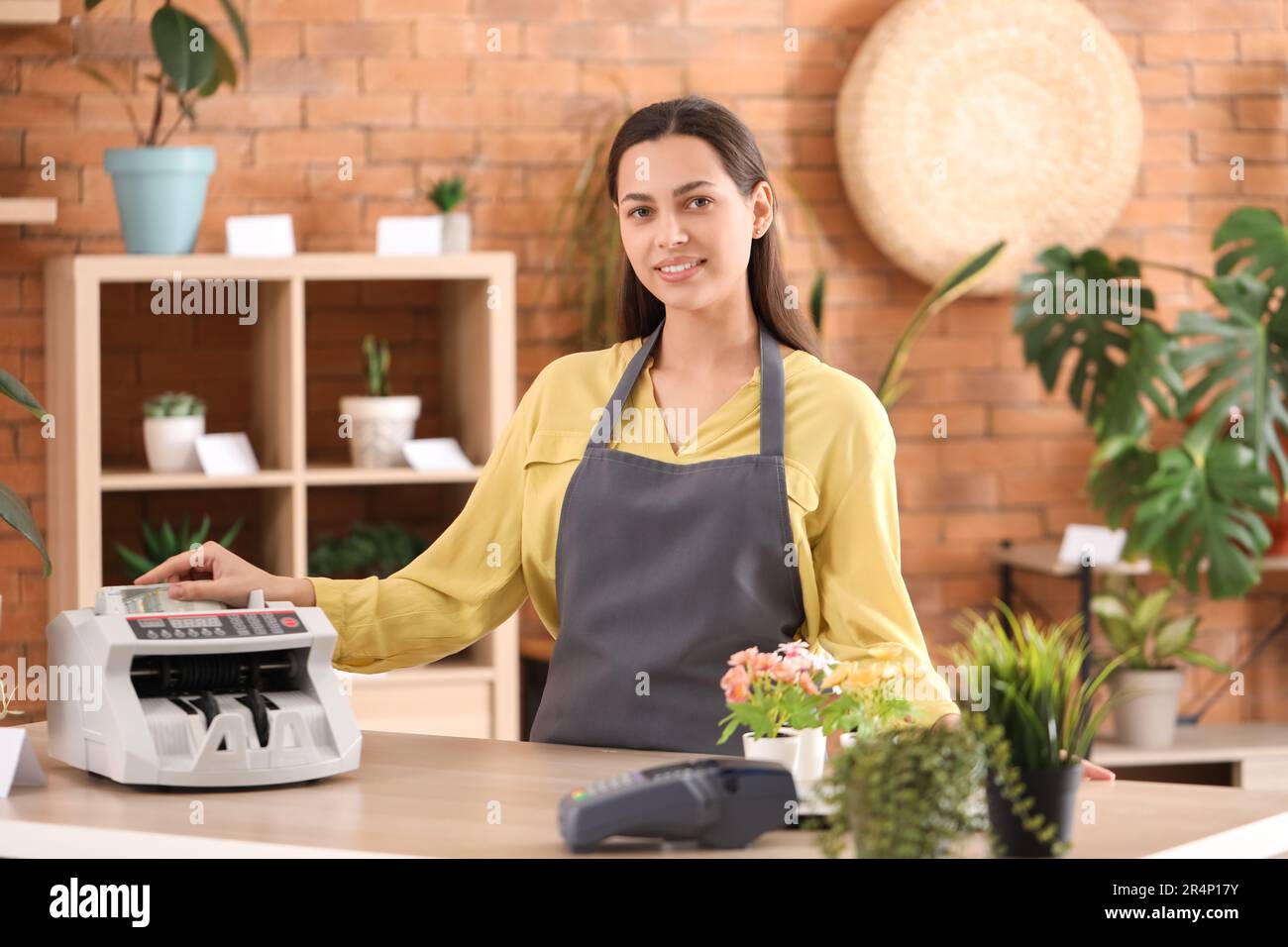Woman euro banknotes using hi-res stock photography and images - Alamy