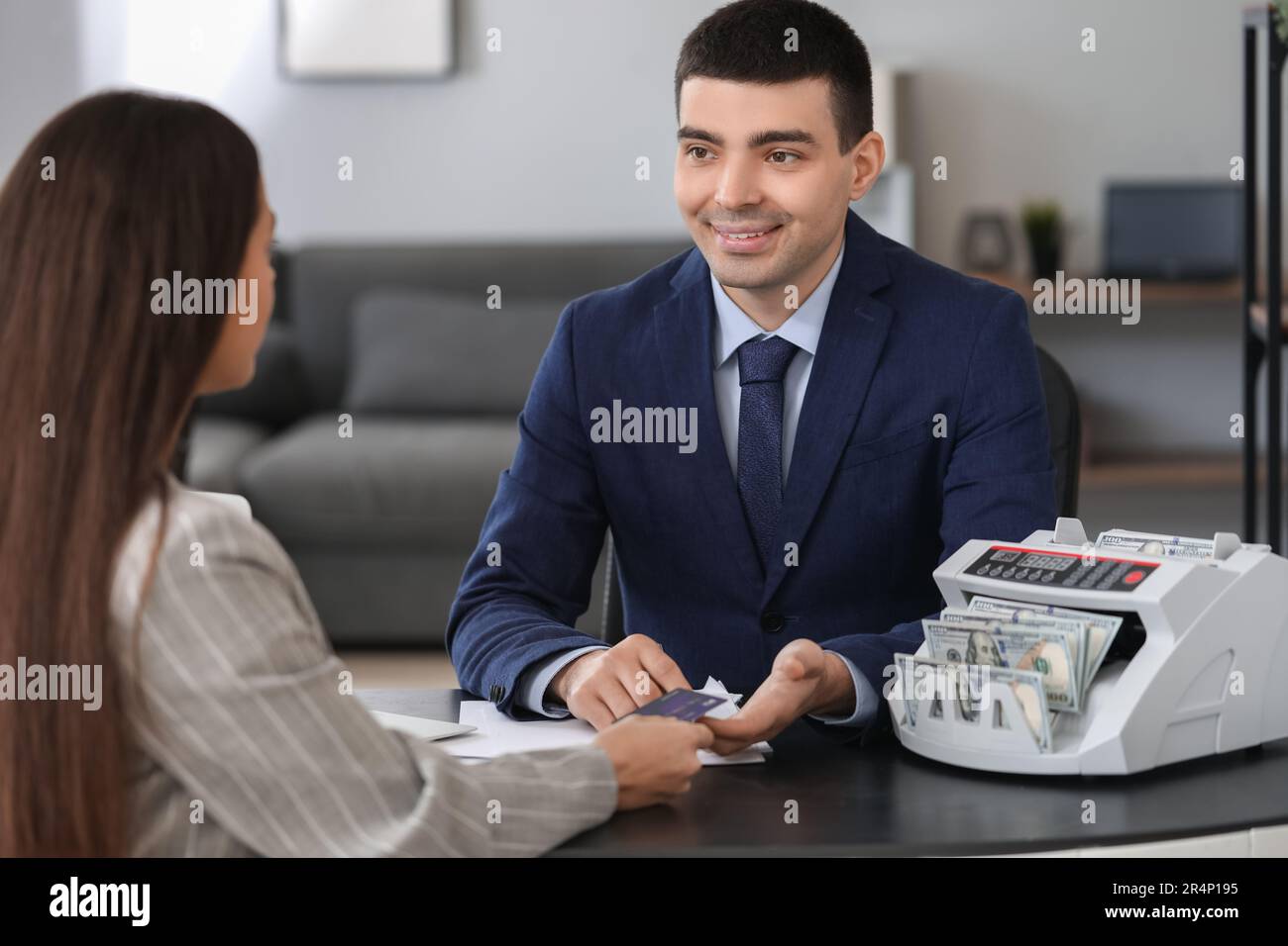 Taking count money hi-res stock photography and images - Alamy