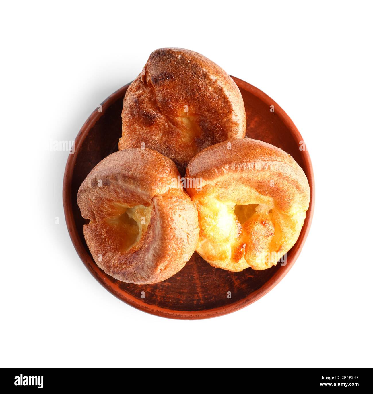Plate with tasty Yorkshire pudding isolated on white background Stock ...
