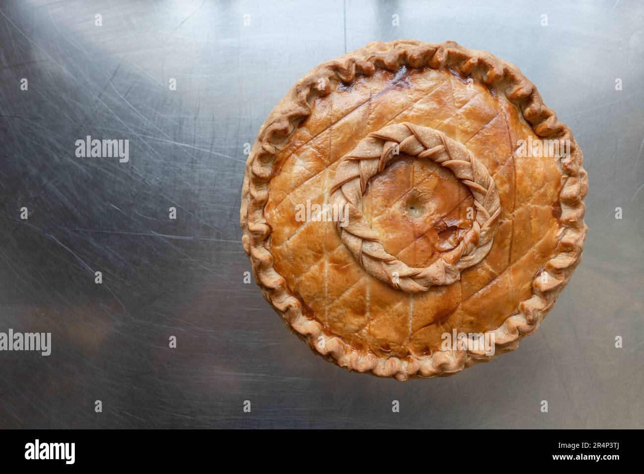 Golden brown traditional 9 inch Pork Pie top view Stock Photo - Alamy