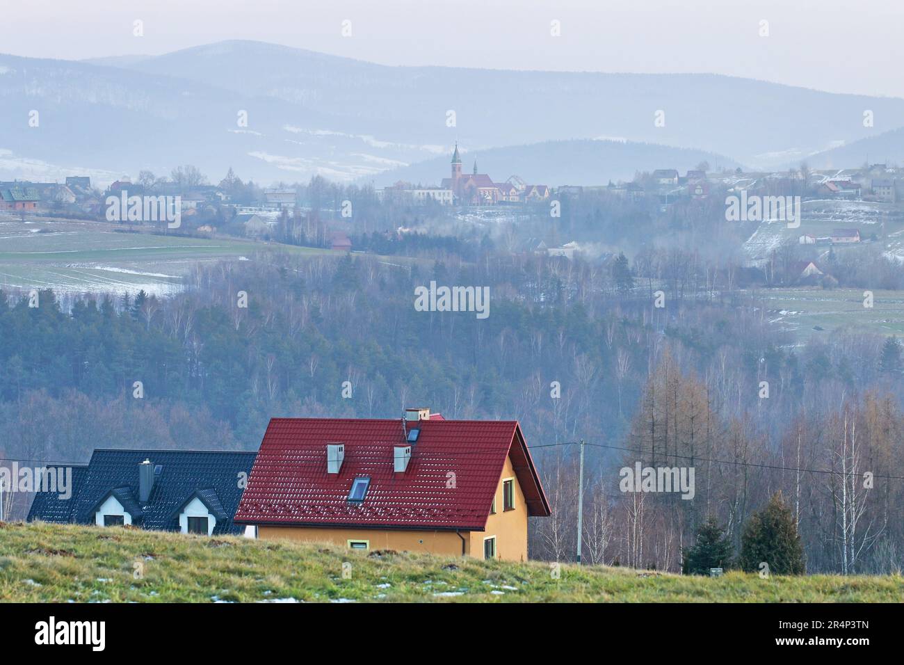 Typical polish landscape with houses on hills in Myslenice, Poland ...