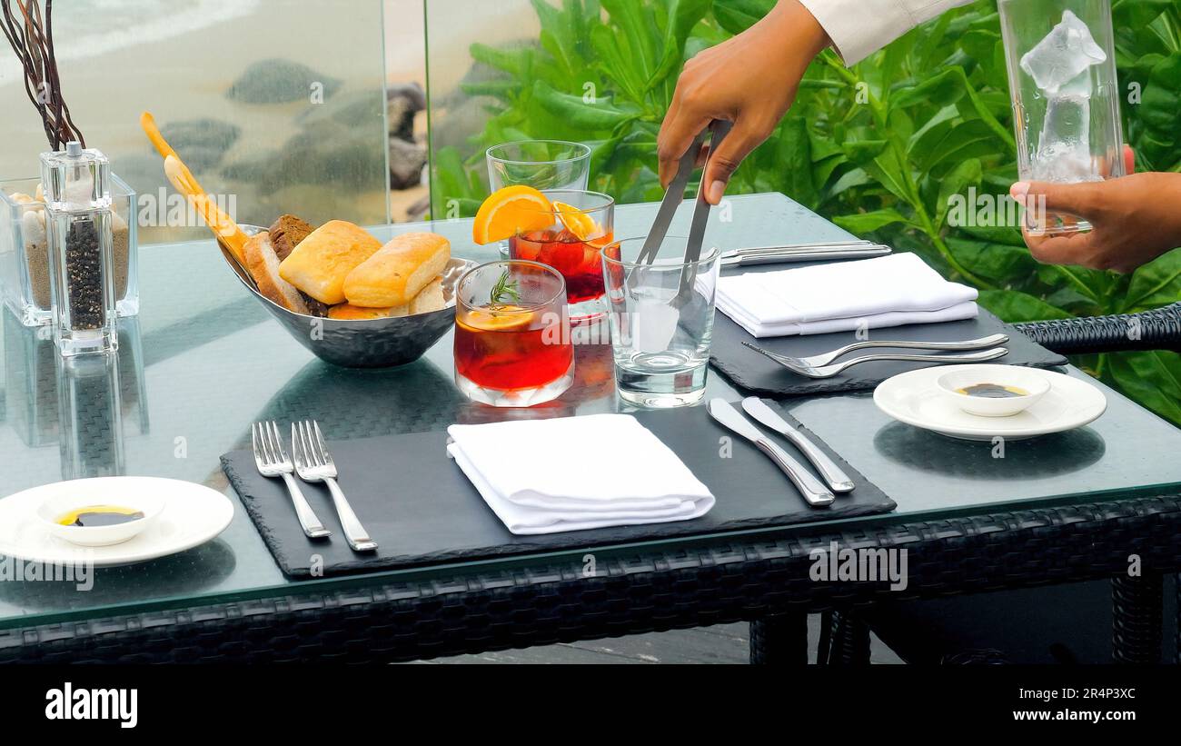 Dinner table overlooking ocean hi-res stock photography and images - Alamy