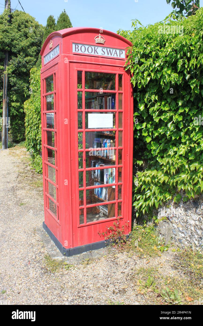 Phone box book swap Stock Photo - Alamy